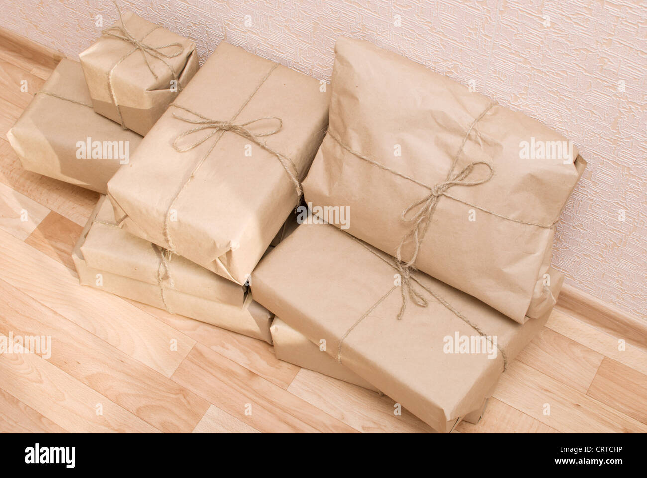 shipping boxes on a floor Stock Photo - Alamy