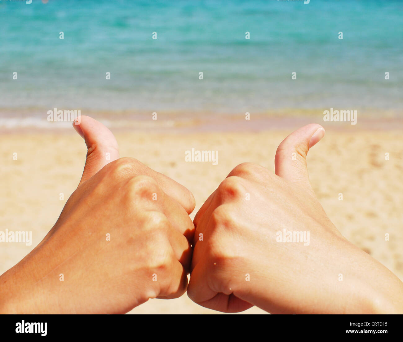 sign from hands over sea background Stock Photo - Alamy