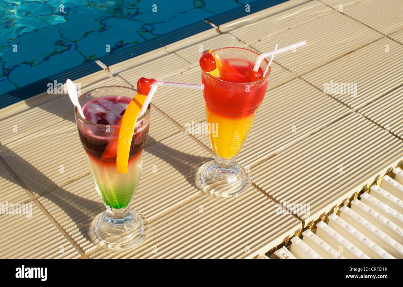 two cocktails near swimming pool Stock Photo - Alamy
