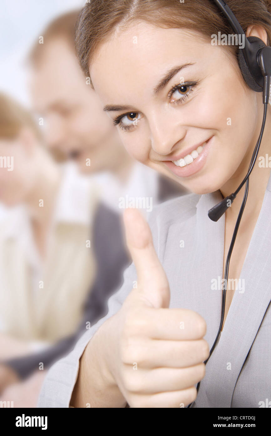 Group of successful customer service people, with focus on a female ...