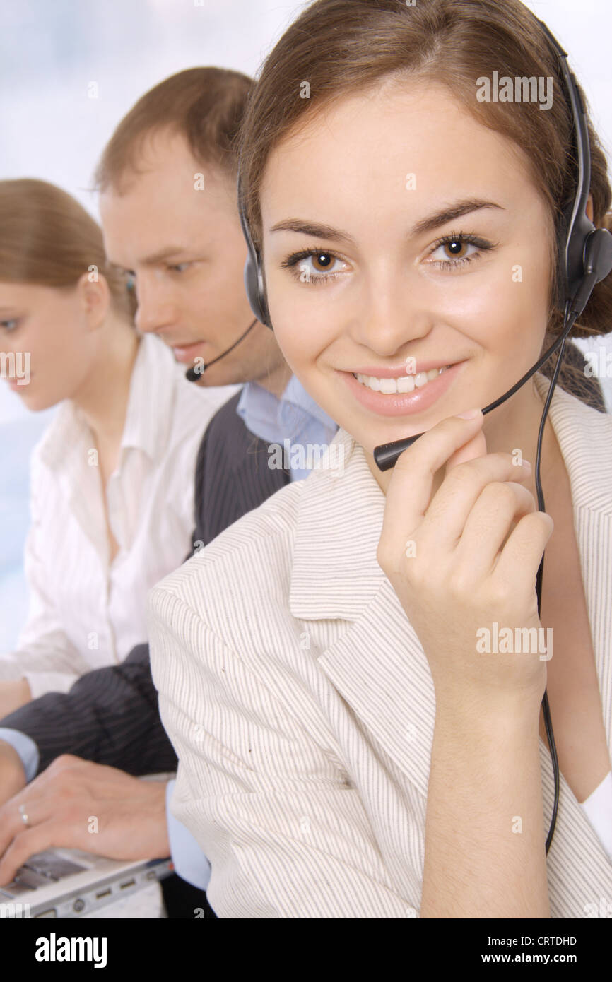 Group of successful customer service people, with focus on a female ...