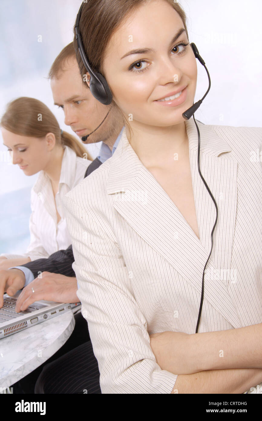Group of successful customer service people, with focus on a female ...