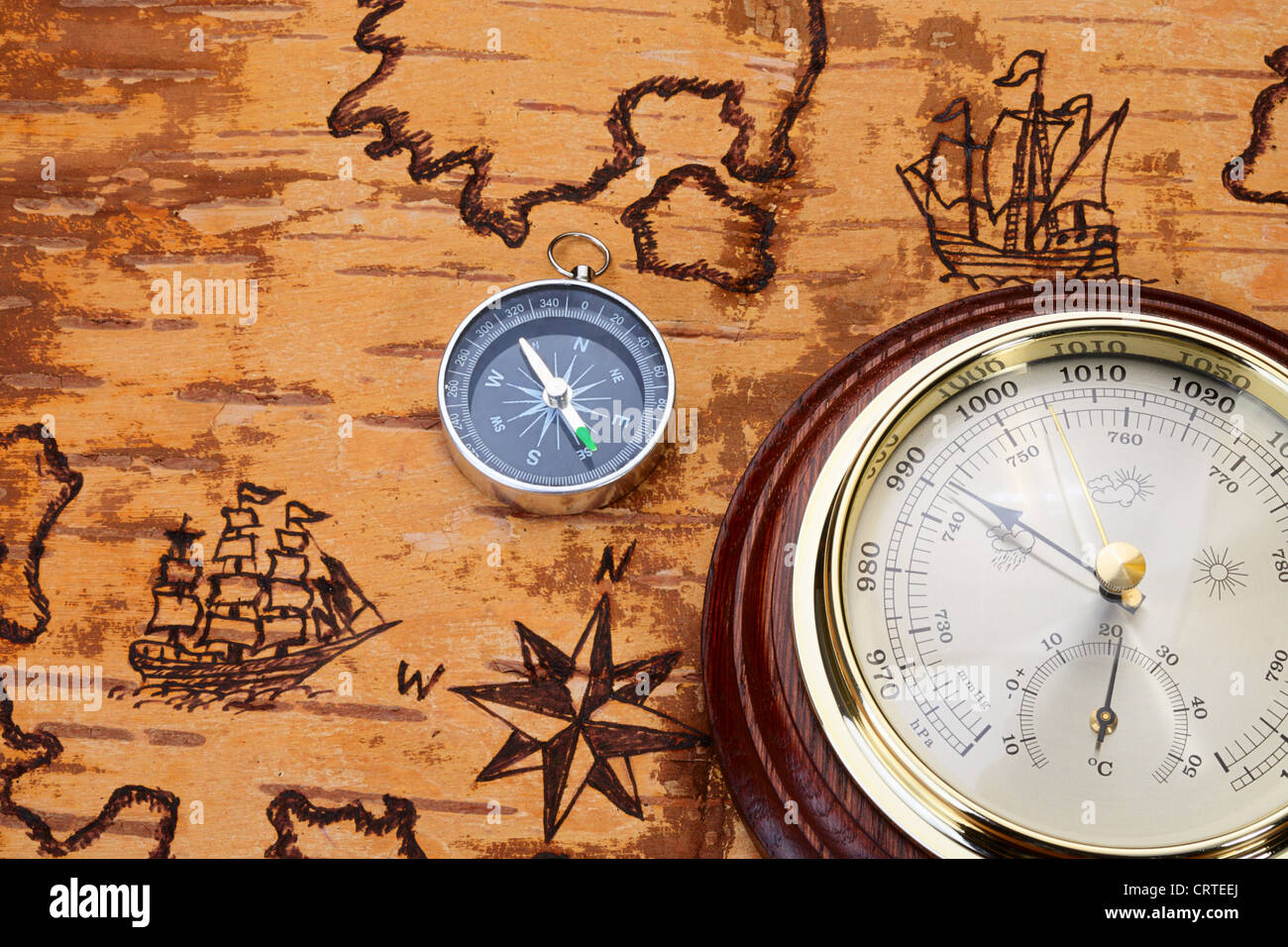 Compass and barometer on sea chart on the order of olden time Stock ...