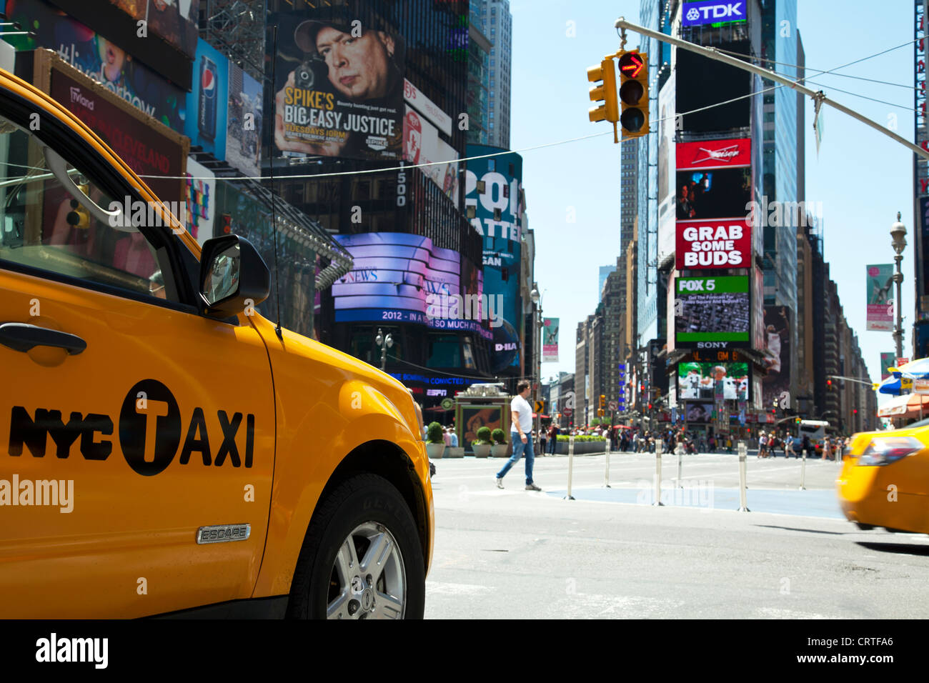 The iconic yellow taxi cab in Times Square, New York city USA. Times ...