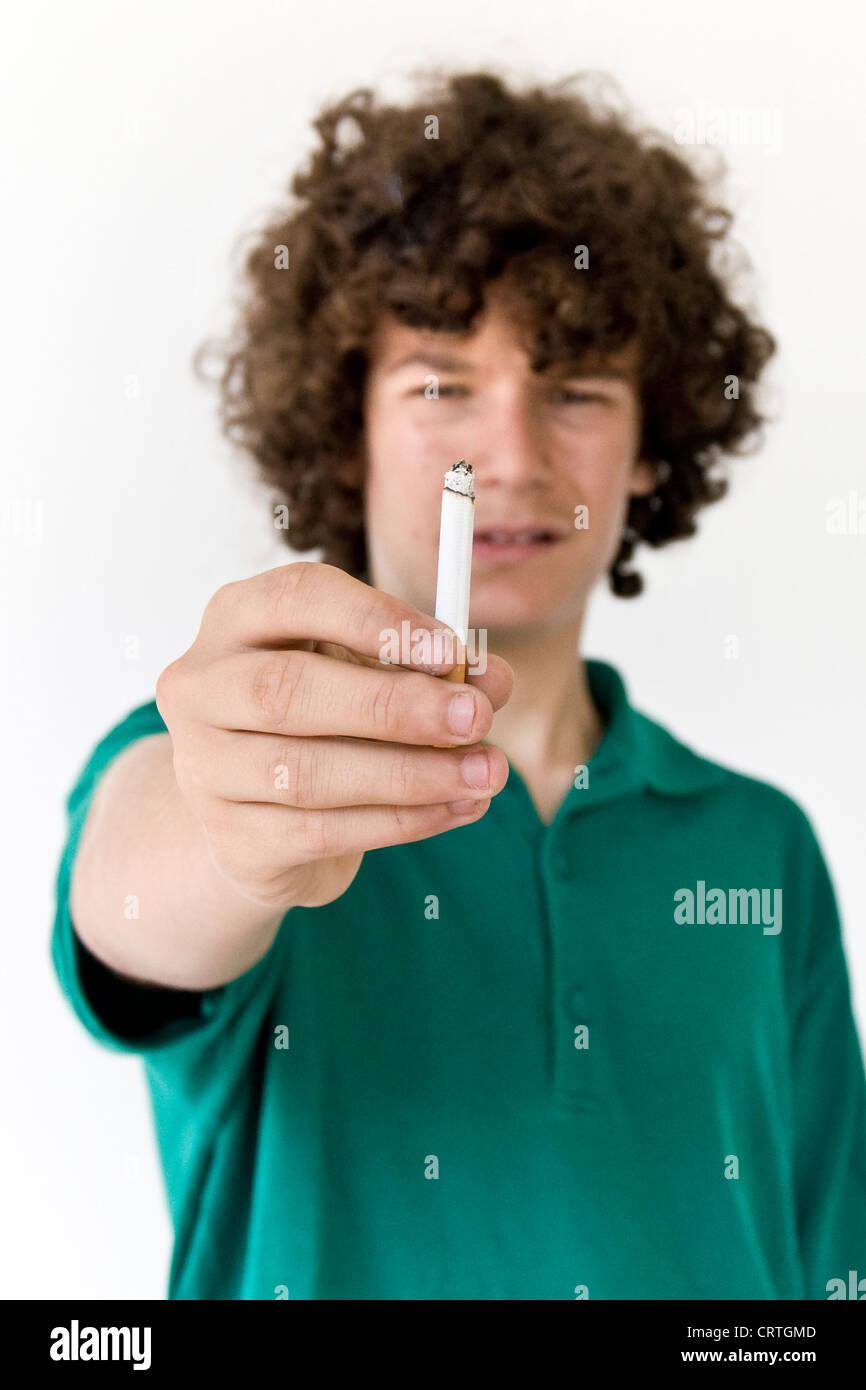 Boy with cigarette Stock Photo - Alamy