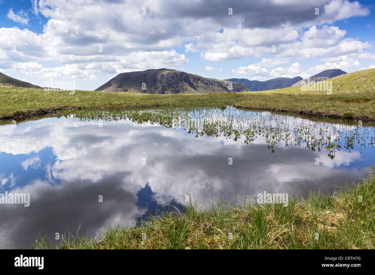 Reflections of the sky in a tarn at Gillercomb Head, Brandreth in the ...