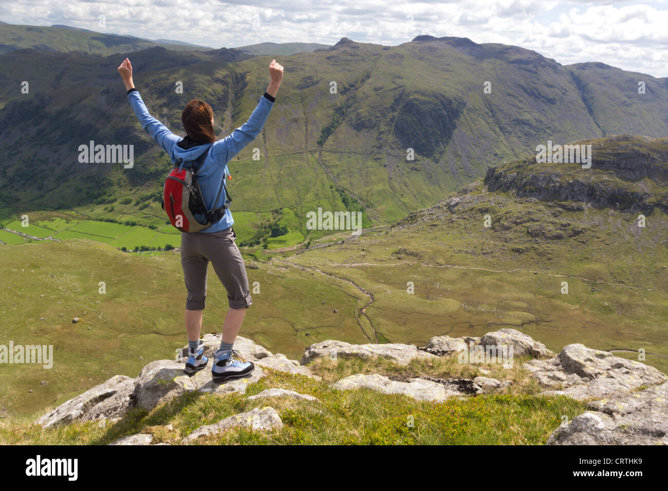 A rock scrambler celebrates climbing Rabbits Trod rock scramble on ...