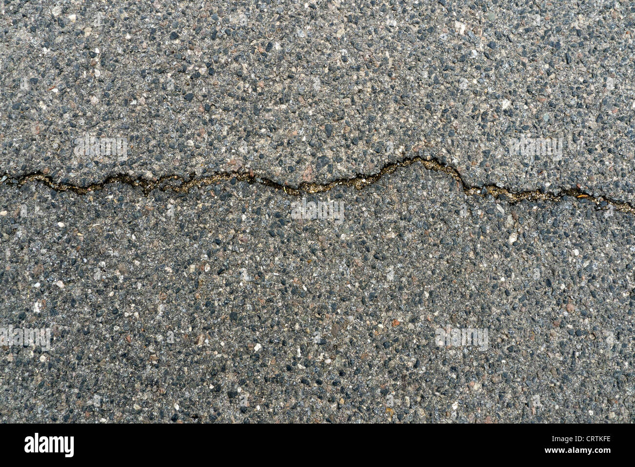 cracked and damaged asphalt Stock Photo - Alamy