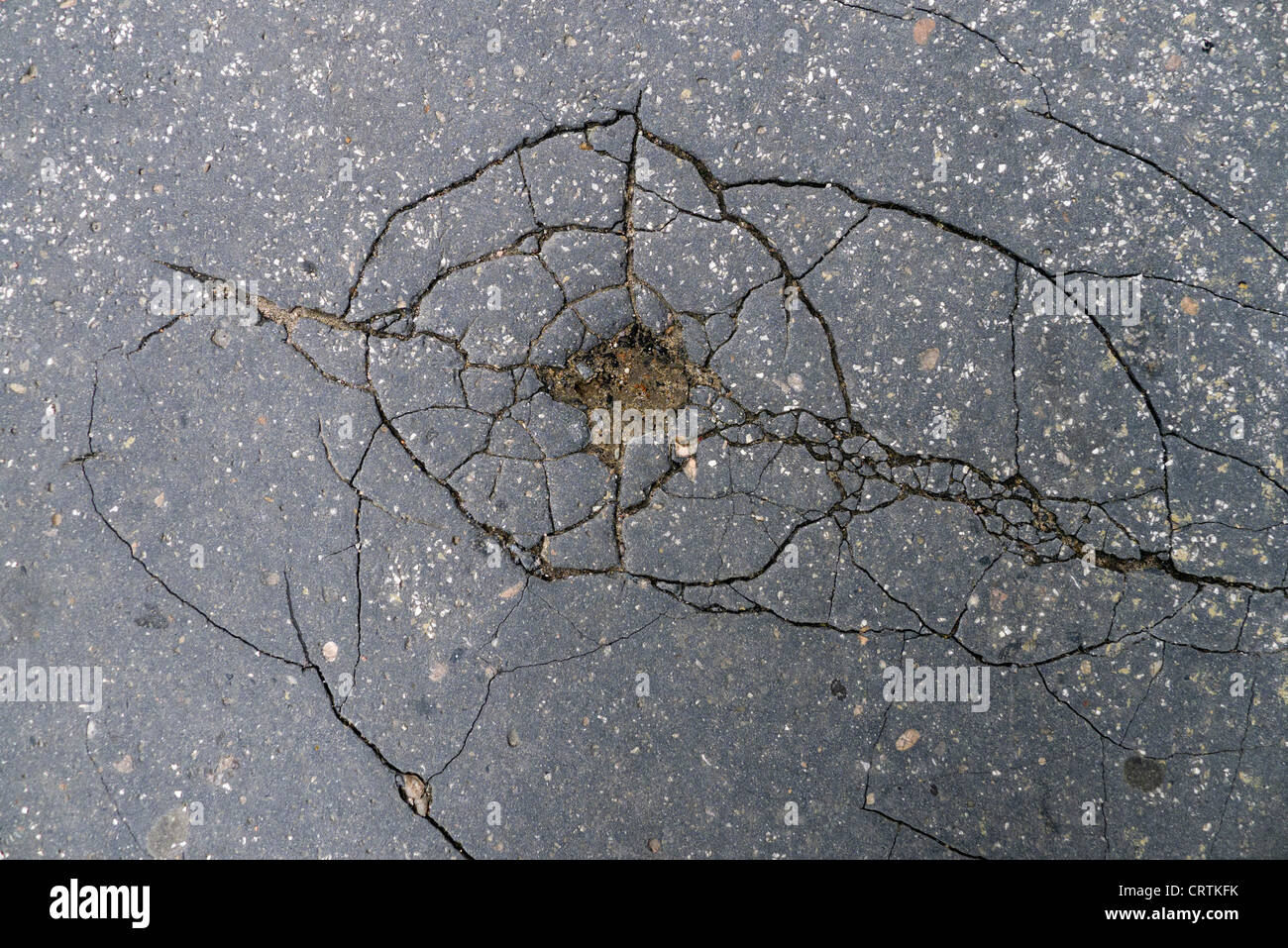 cracked and damaged asphalt Stock Photo - Alamy