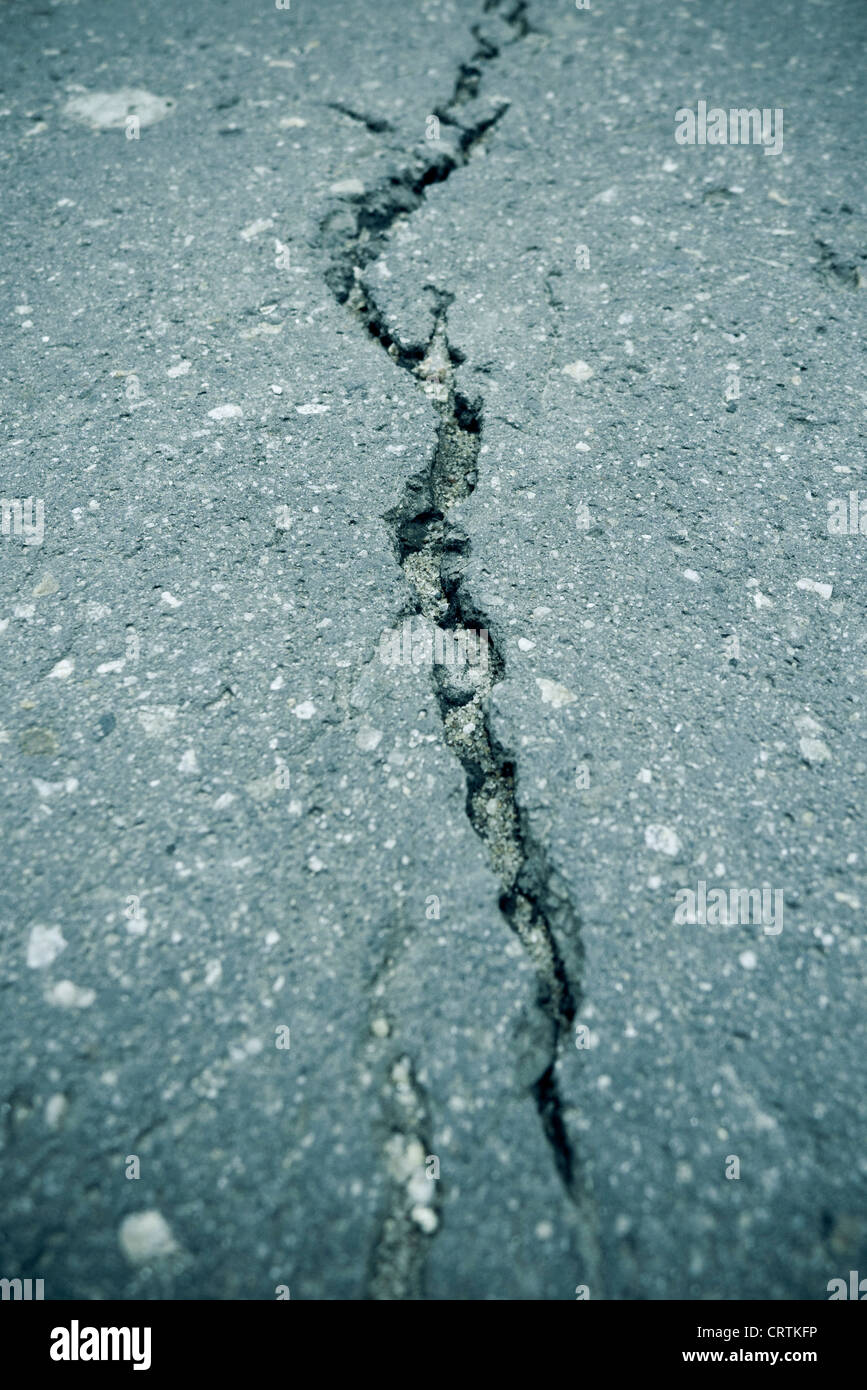 cracked and damaged asphalt Stock Photo - Alamy