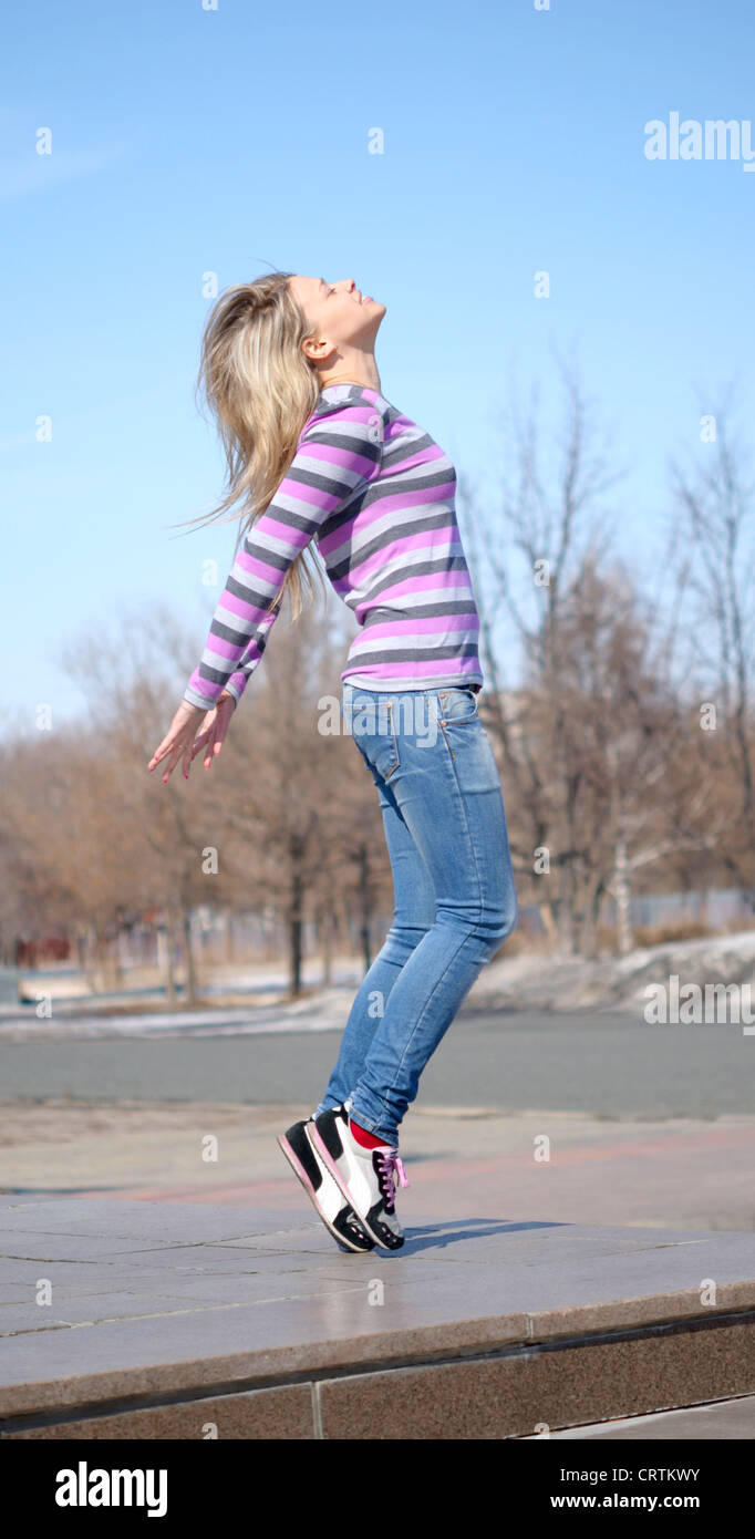dancing woman in the spring Stock Photo - Alamy