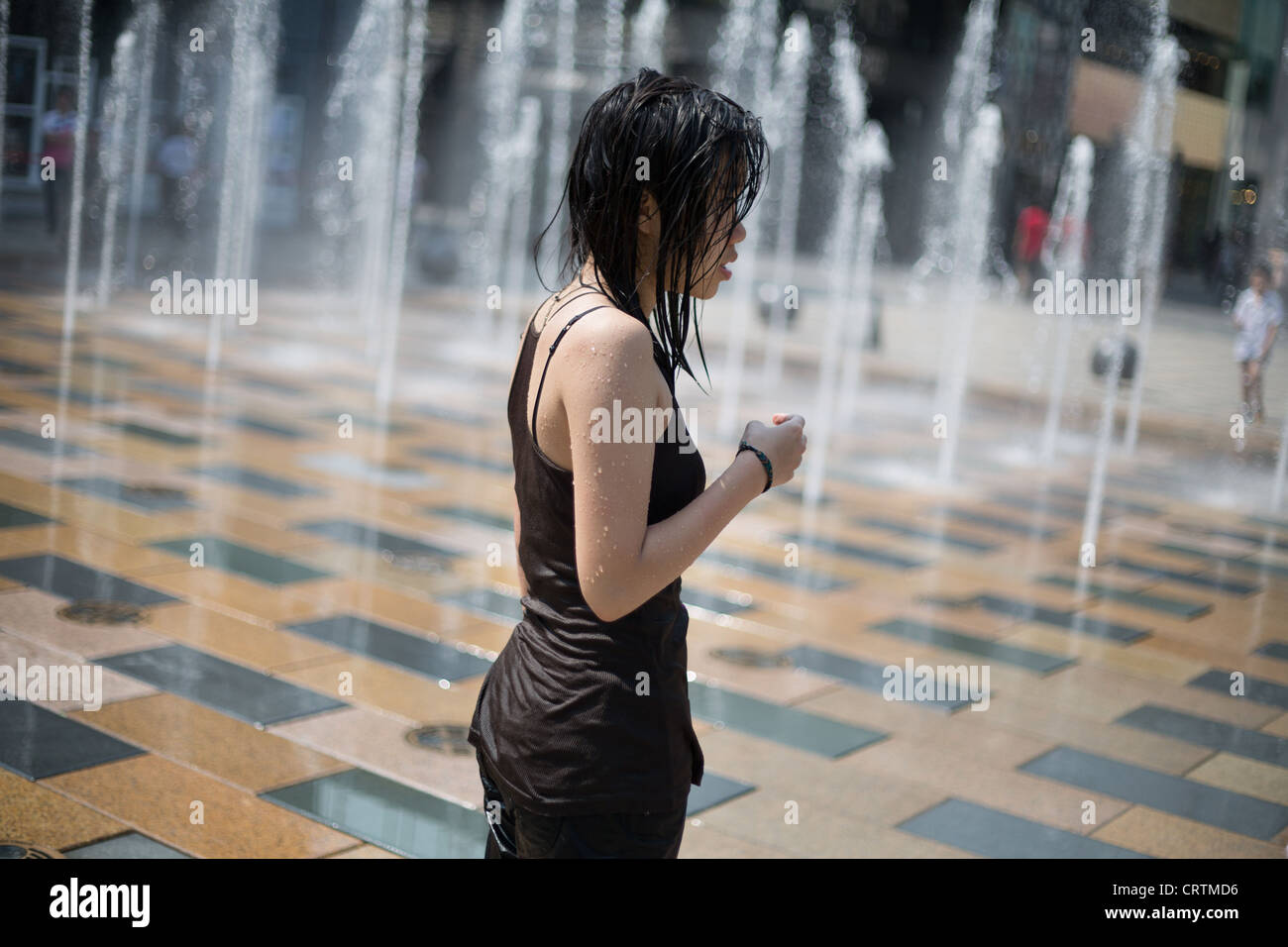 Fountain girl soaking wet hi-res stock photography and images - Alamy