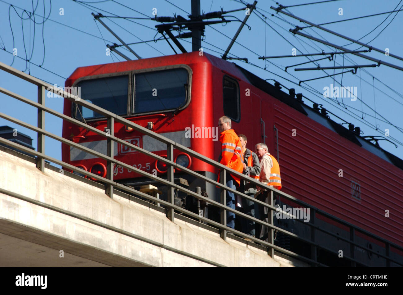 Railway workers in Berlin Stock Photo - Alamy