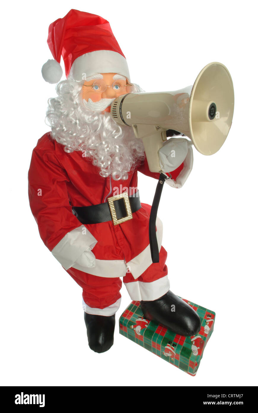 Santa Claus with megaphone standing on gift Stock Photo - Alamy
