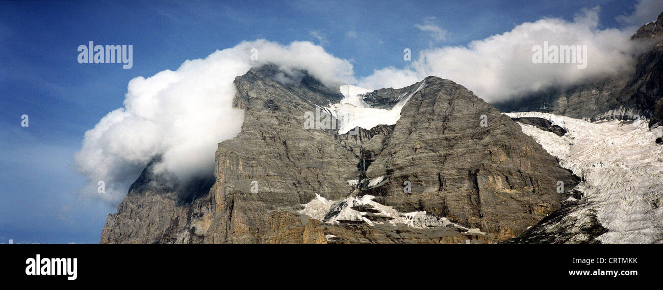 The Eiger mountain in Switzerland frame covered by clouds Stock Photo ...