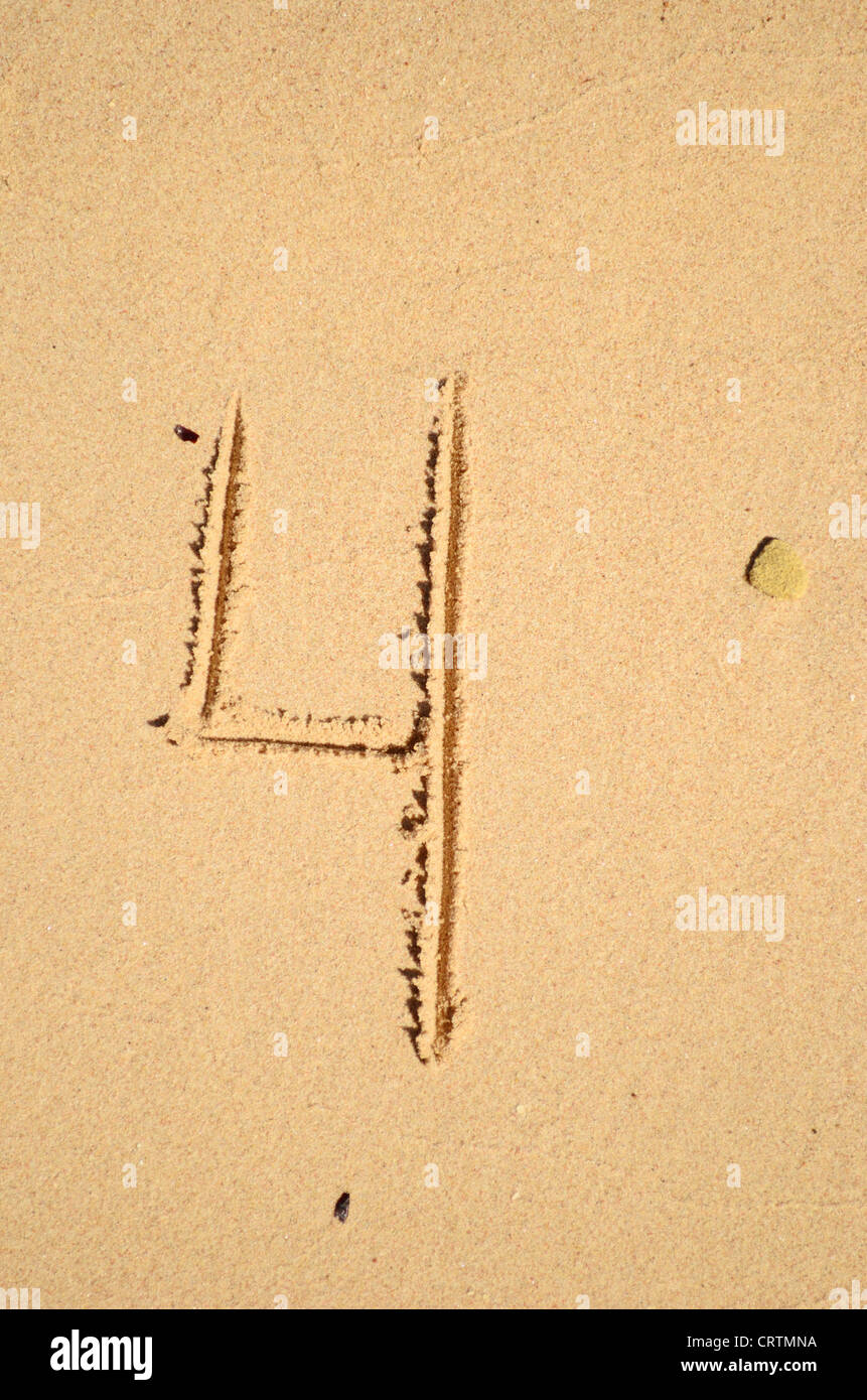 number four written on the sand Stock Photo - Alamy