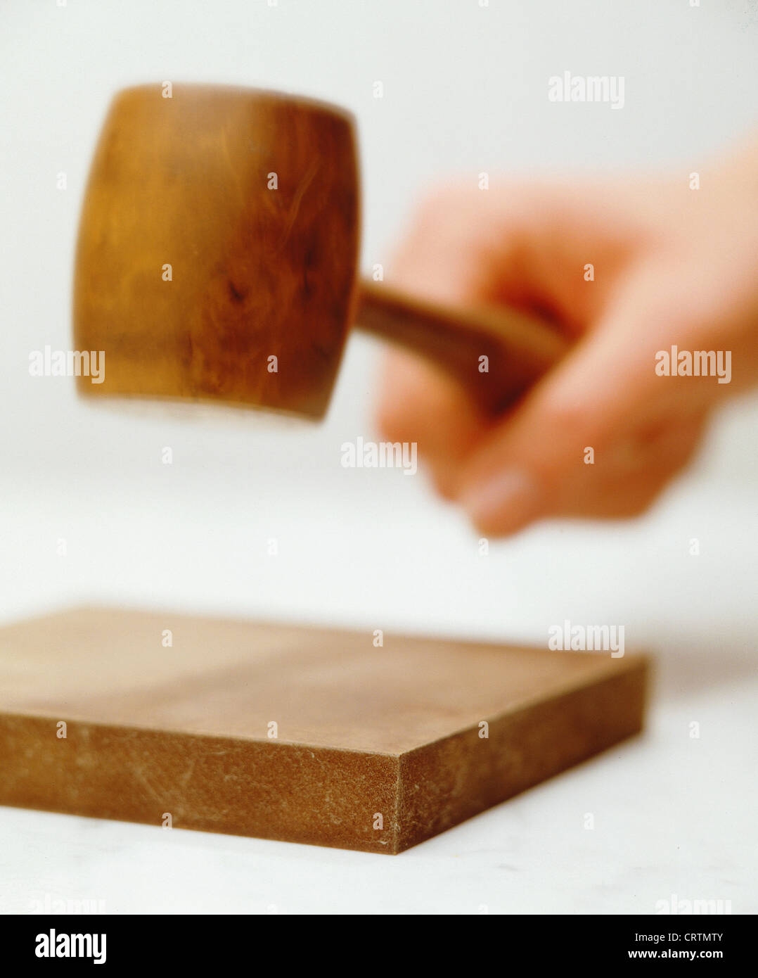 Hand with hammer Stock Photo - Alamy