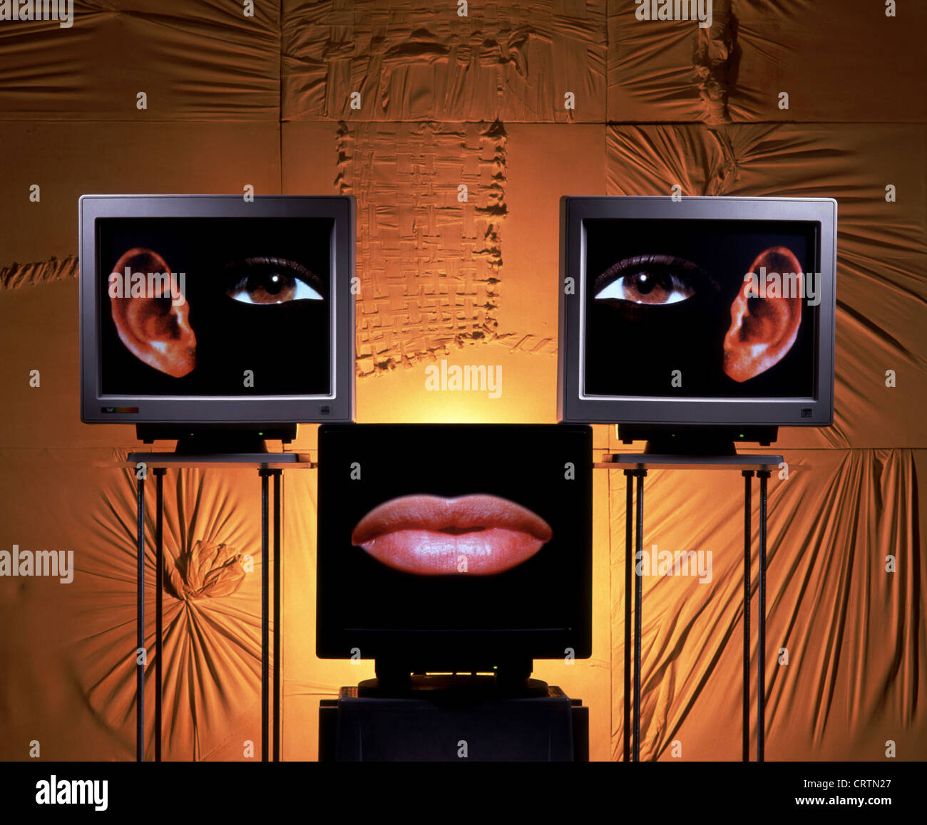 3 monitors with face Stock Photo - Alamy