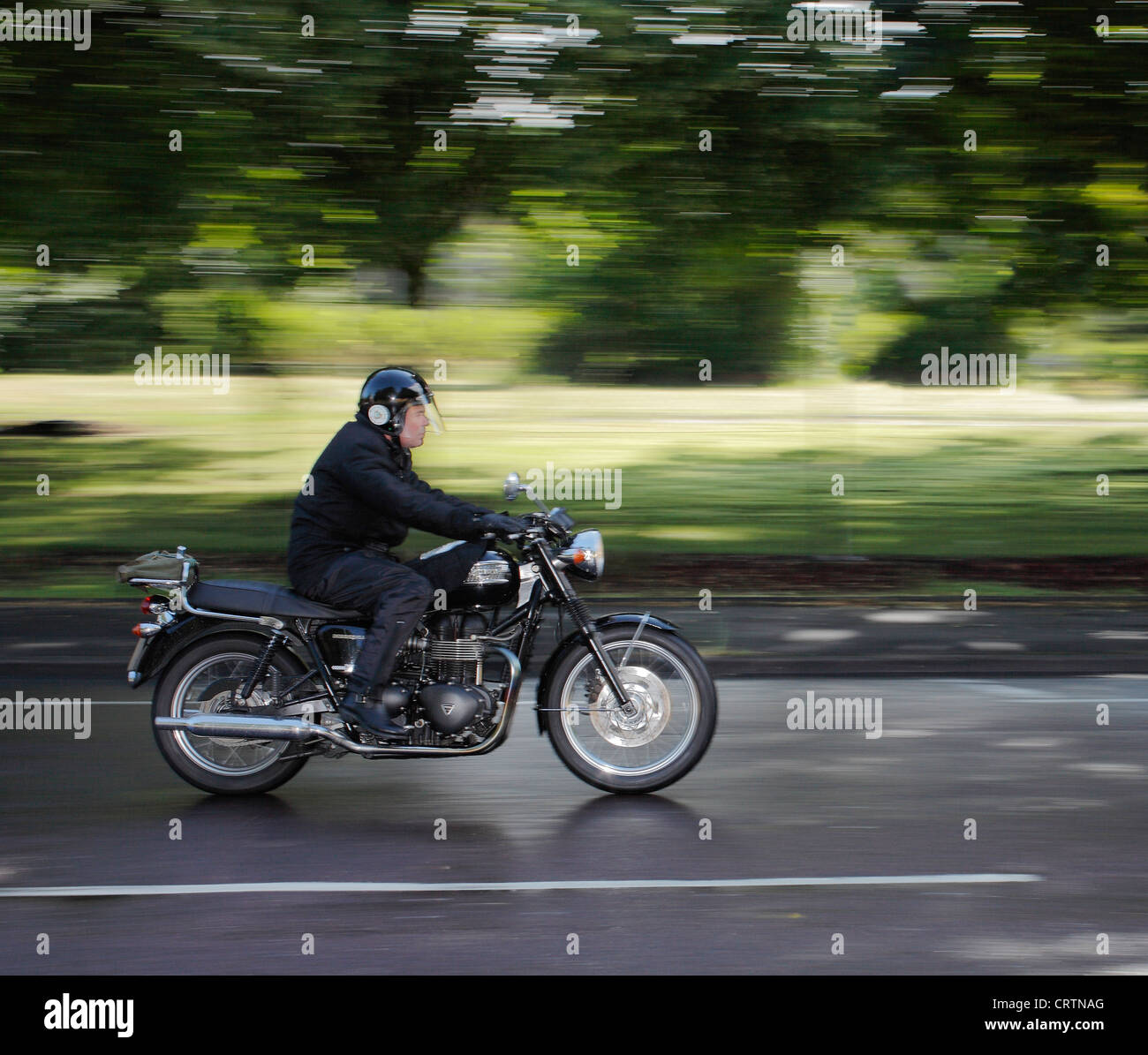 New Triumph Bonneville T100 at speed Stock Photo - Alamy