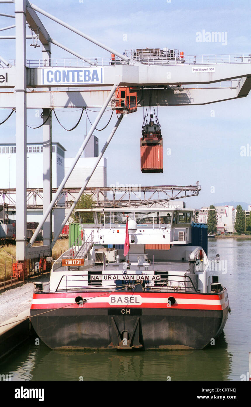 Rhine port of Basel: ship is loaded with containers Stock Photo - Alamy