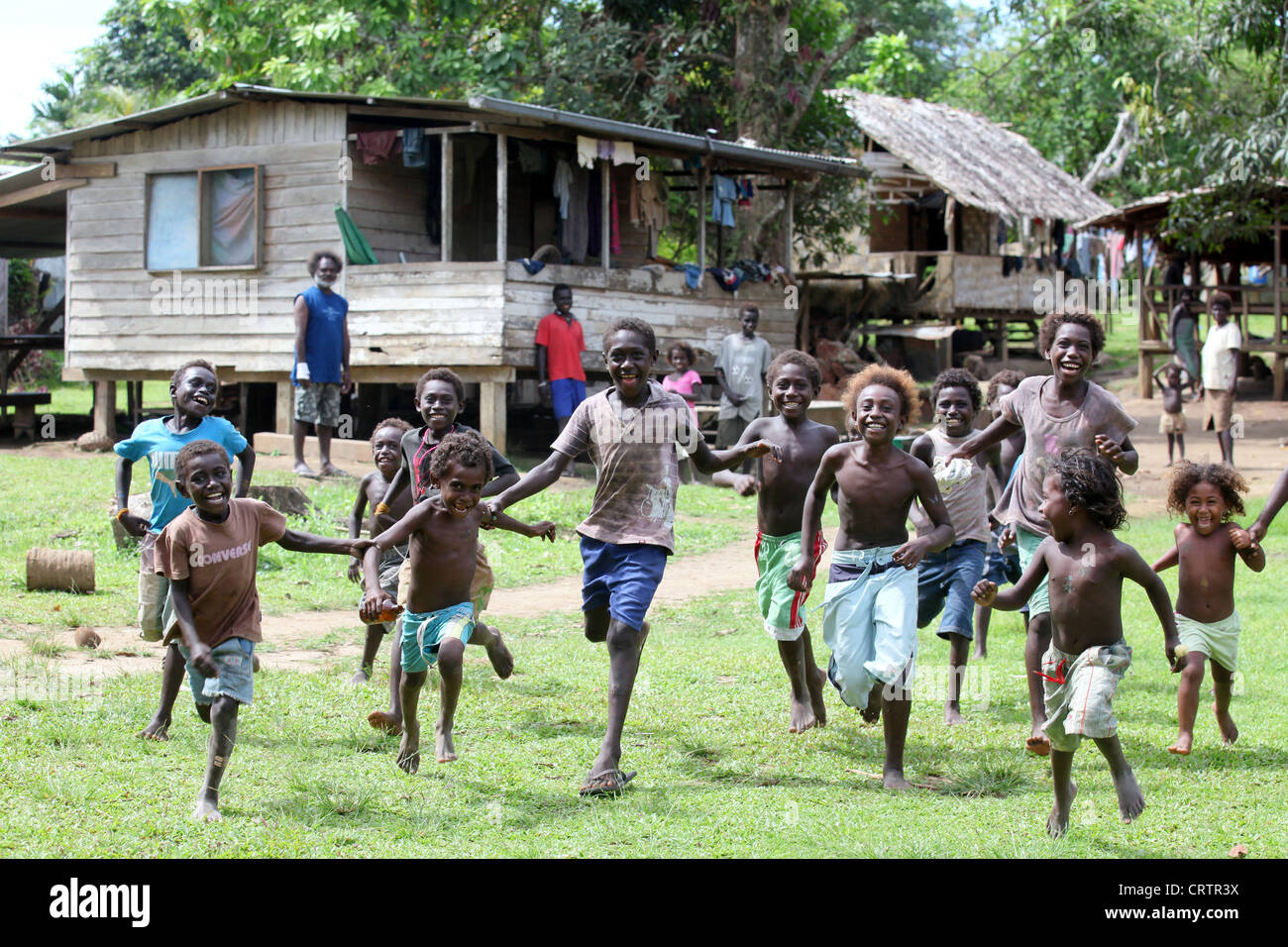 running children in a village on Bougainville Island, Papua New Guinea ...