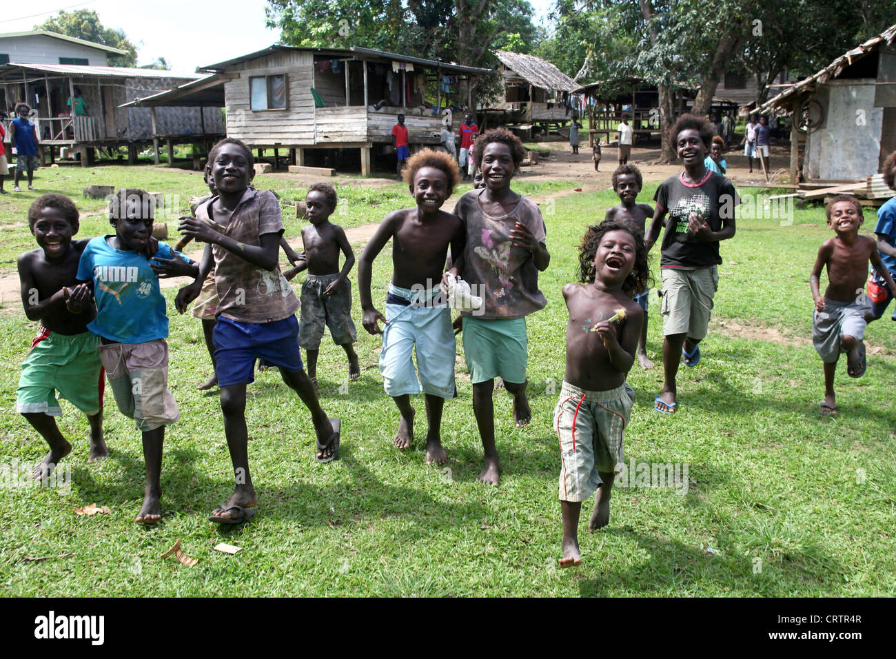 running children in a village on Bougainville Island, Papua New Guinea ...