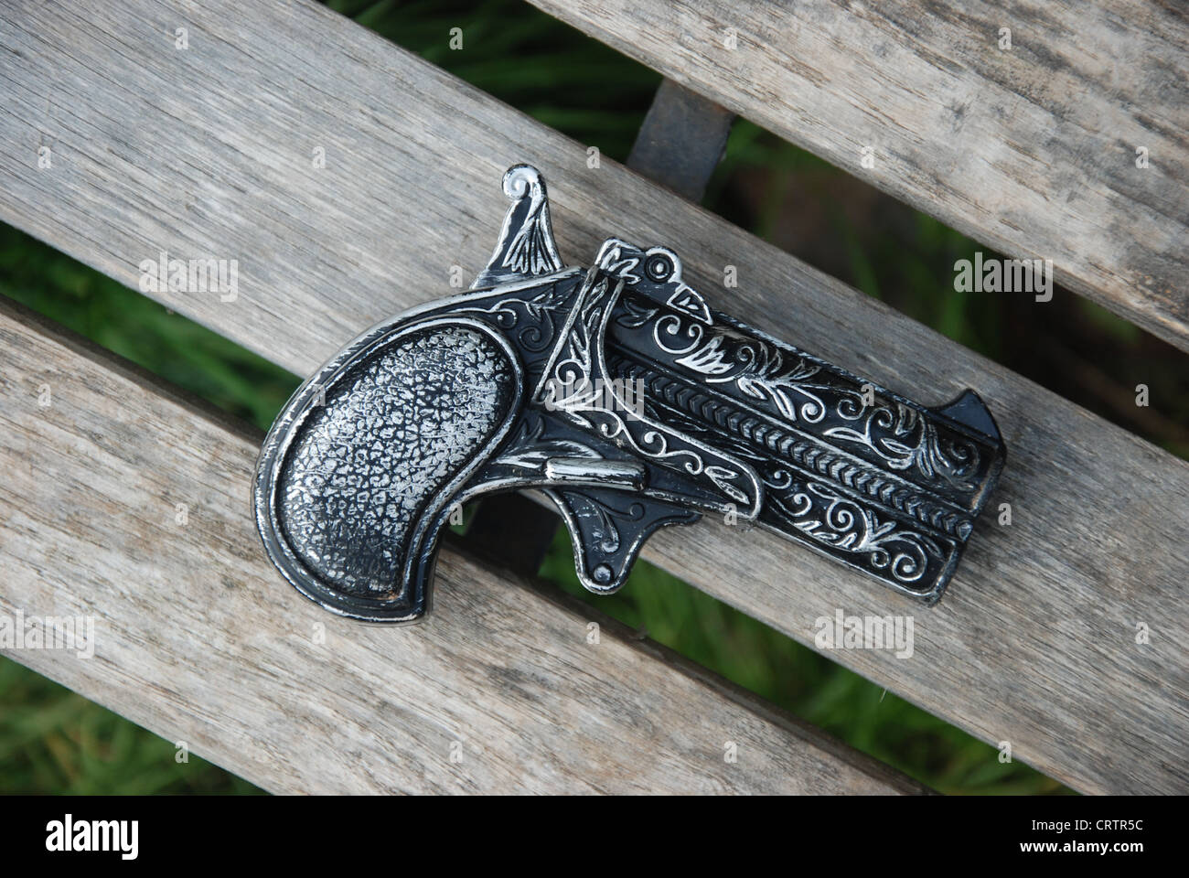 Metal toy gun hi-res stock photography and images - Alamy