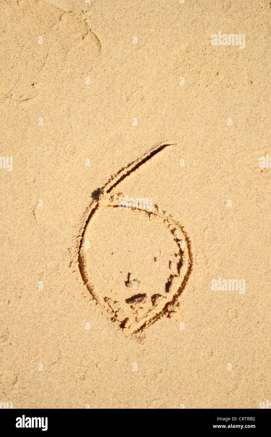 number six written on the sand Stock Photo - Alamy