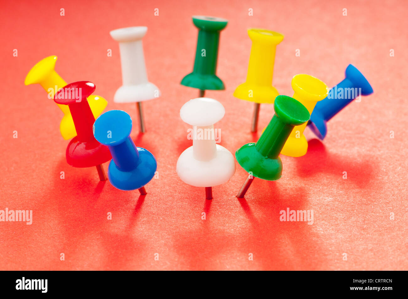 Office pins on the paper Stock Photo - Alamy