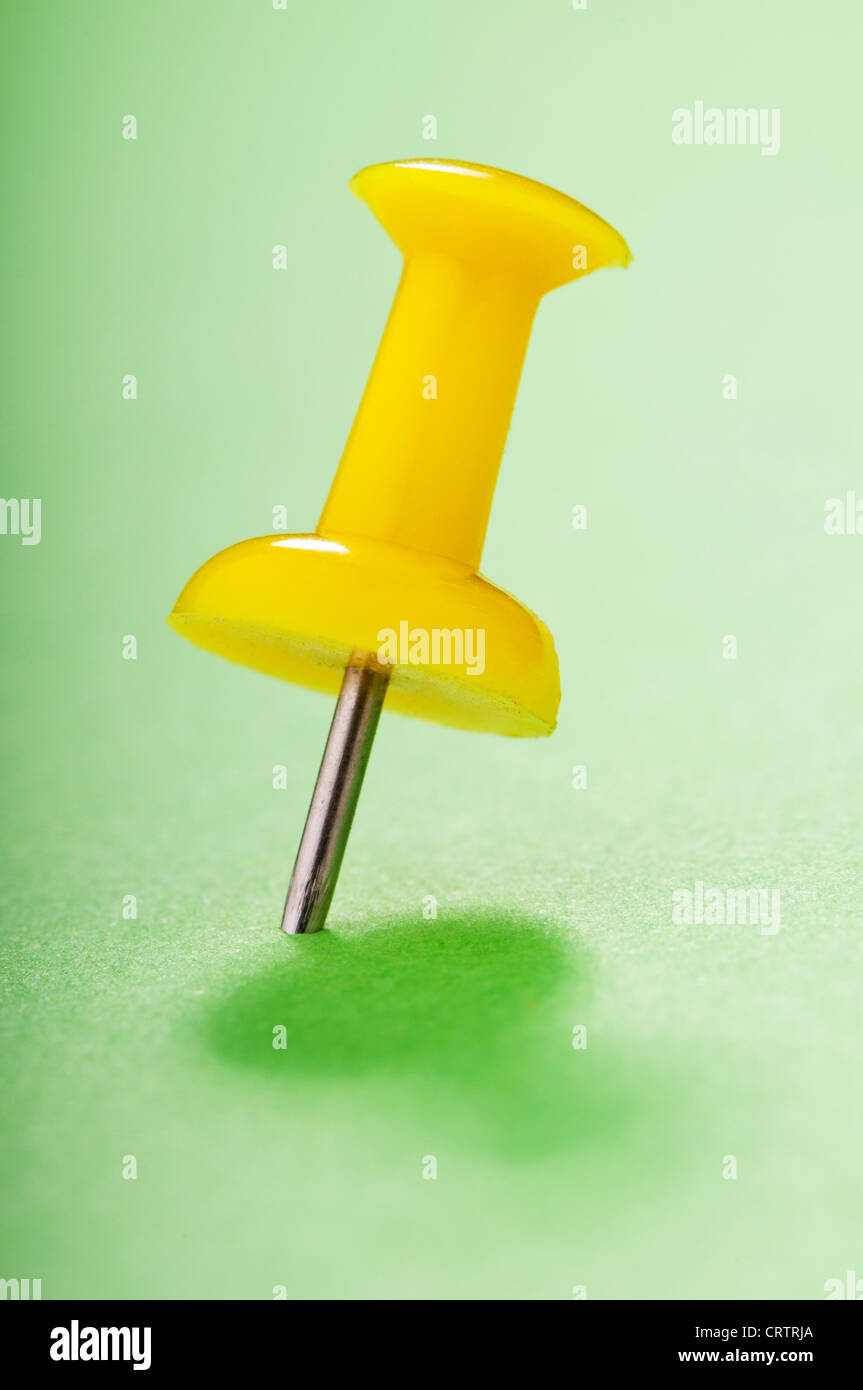 Office pins on the paper Stock Photo - Alamy