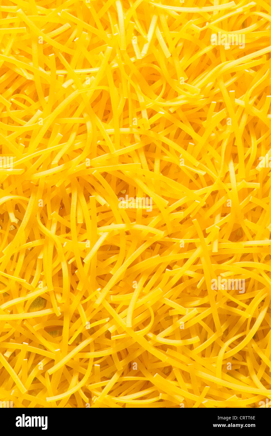 Extreme close up of yellow italian pasta Stock Photo - Alamy