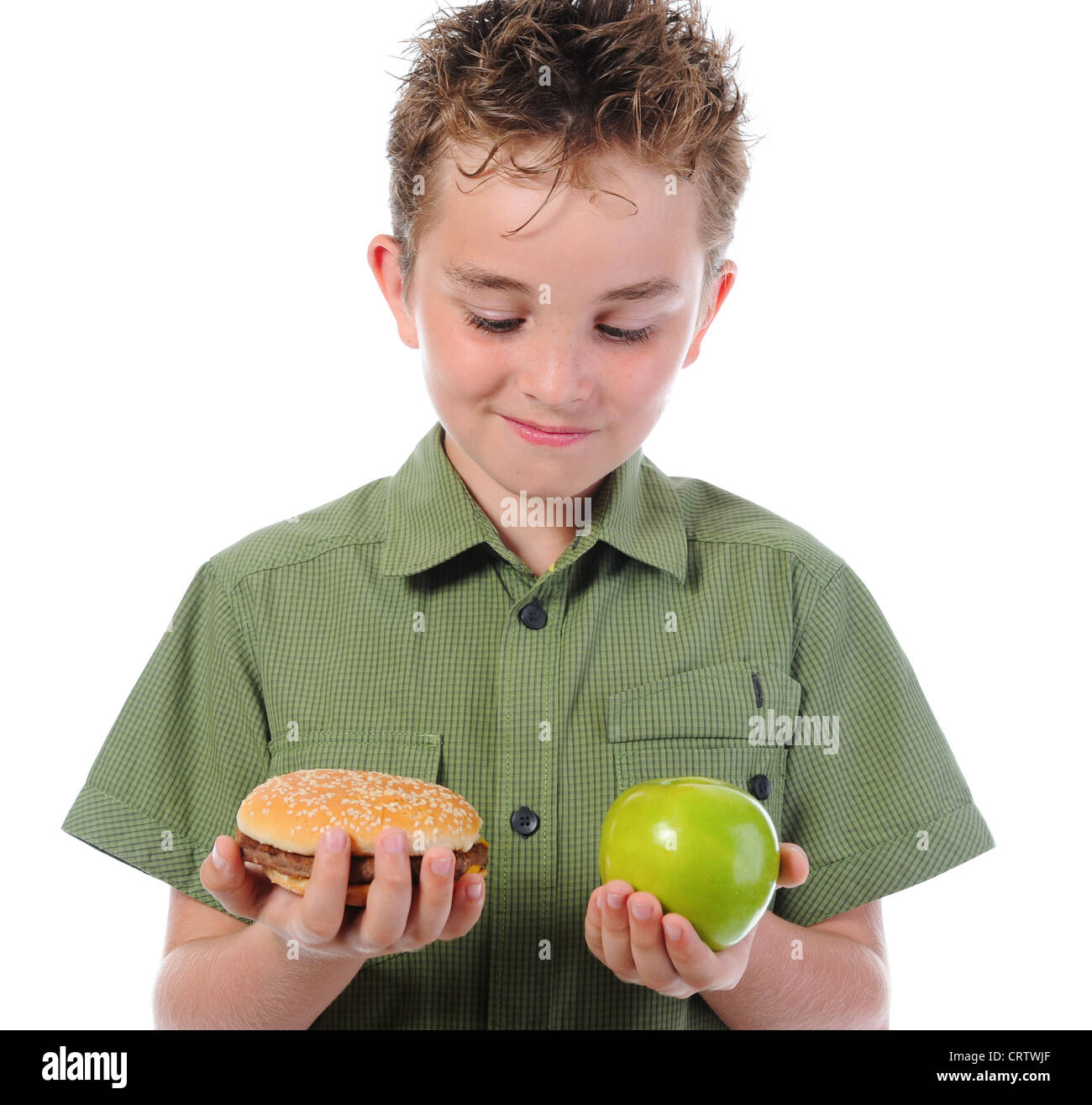 Little boy eating a hamburger Stock Photo - Alamy