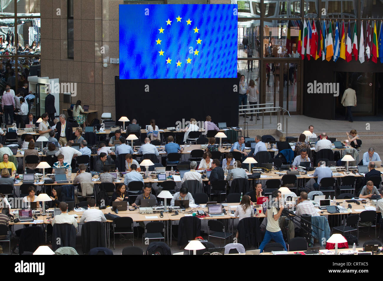 Rows of media working in the Press Centre at European Council offices ...