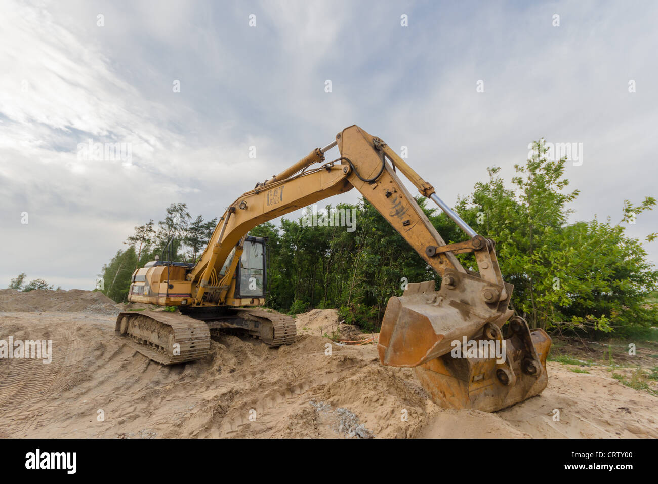 digger, heavy duty construction equipment parked at work site Stock ...