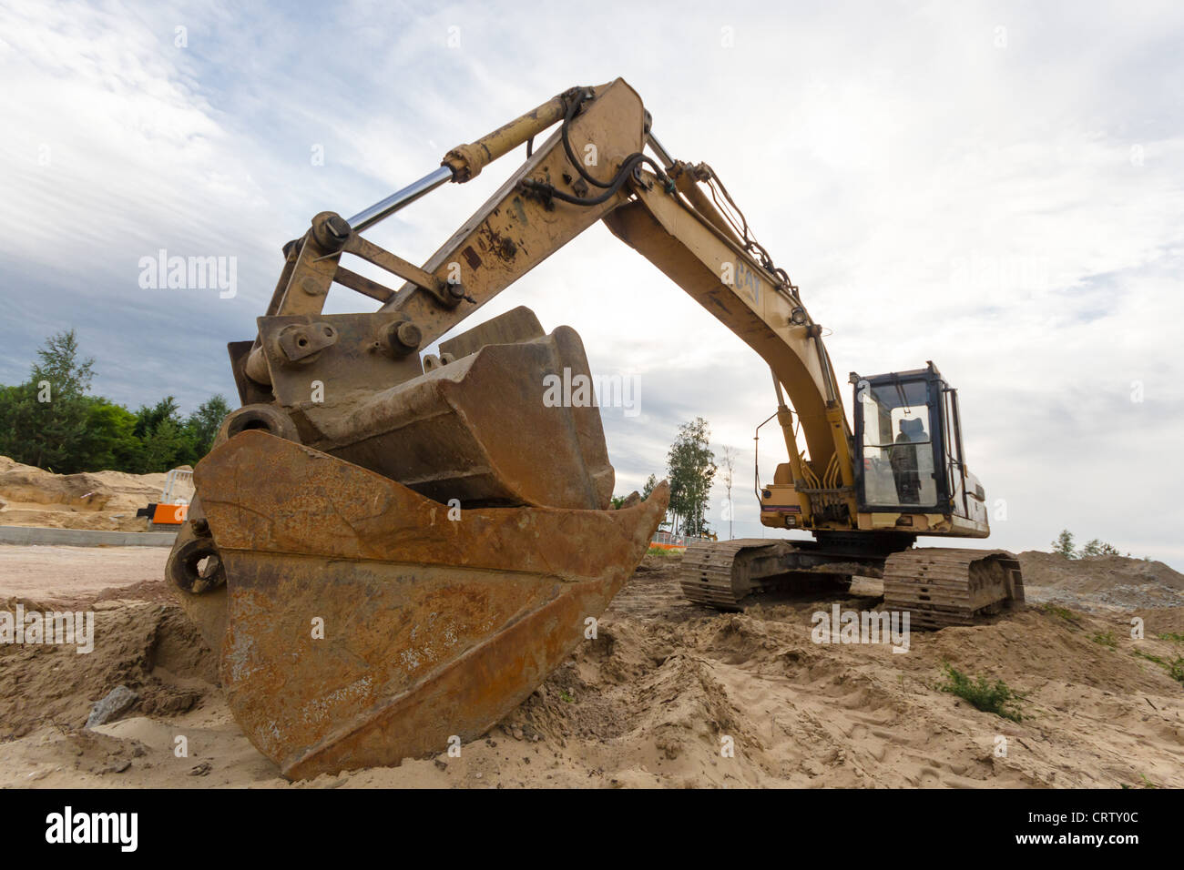 digger, heavy duty construction equipment parked at work site Stock ...