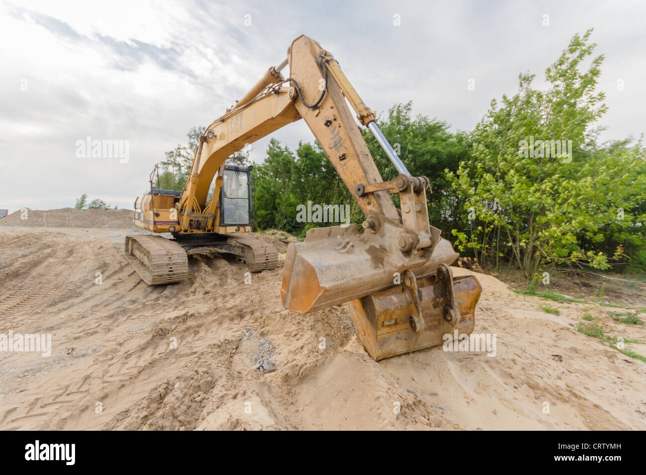 digger, heavy duty construction equipment parked at work site Stock ...