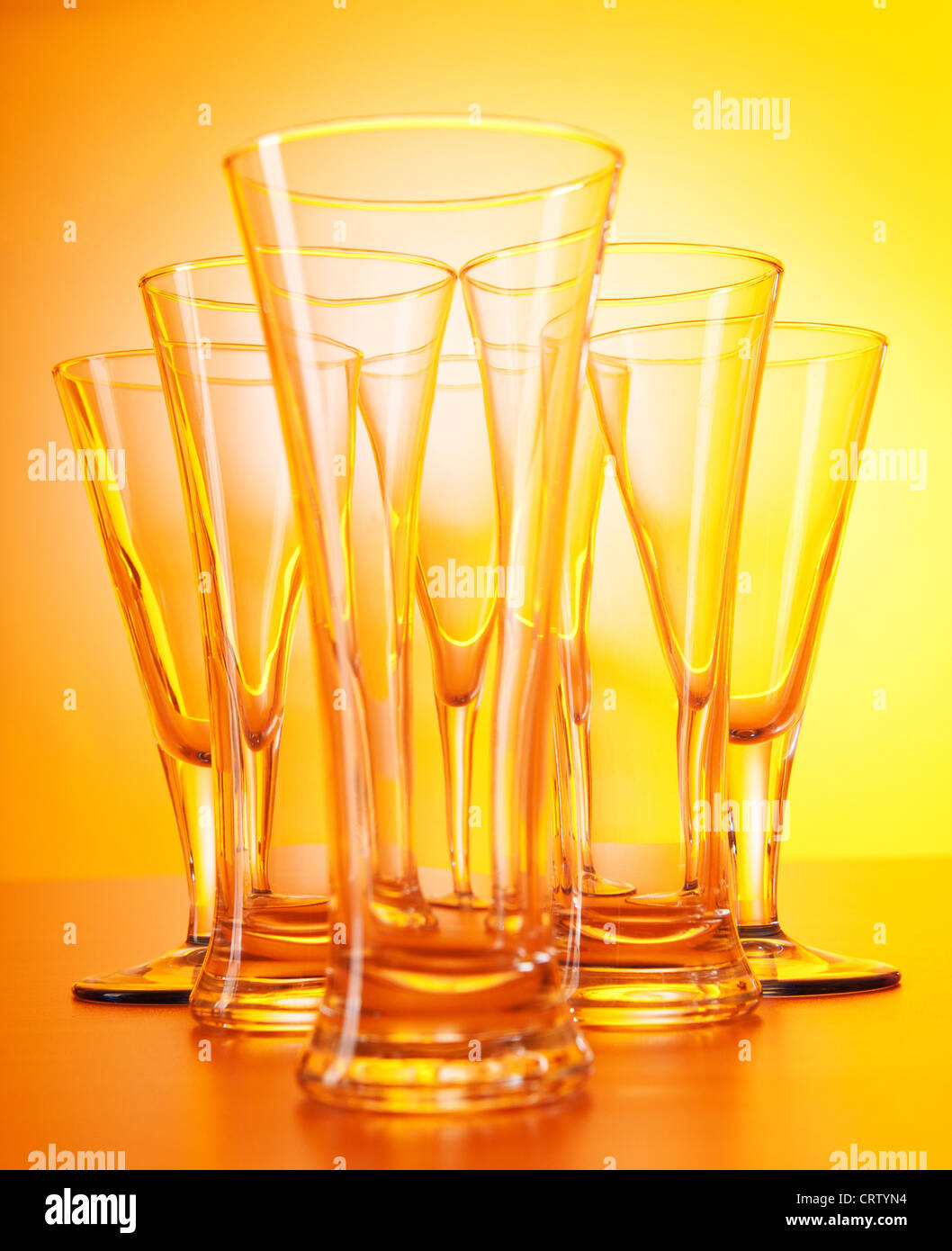 Wine glasses against gradient background Stock Photo - Alamy