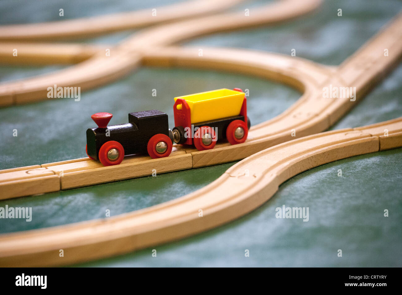 Toy wooden train set on wooden track Stock Photo - Alamy