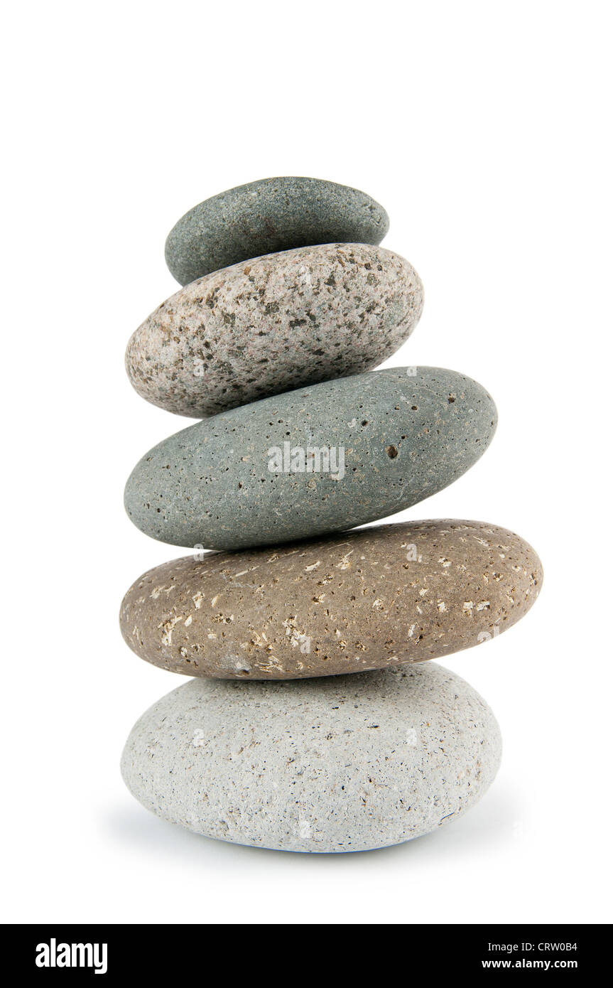Stack of pebbles isolated on the white Stock Photo - Alamy