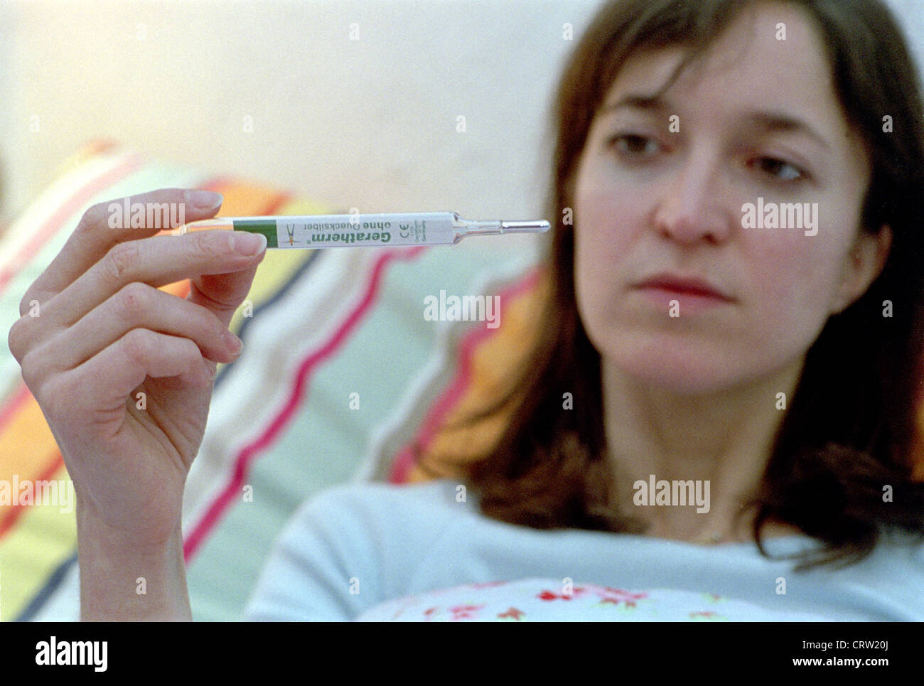 Temperature measurement with maximum thermometer Stock Photo - Alamy