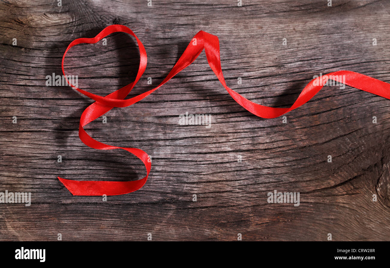 Heart shaped red ribbon Stock Photo - Alamy