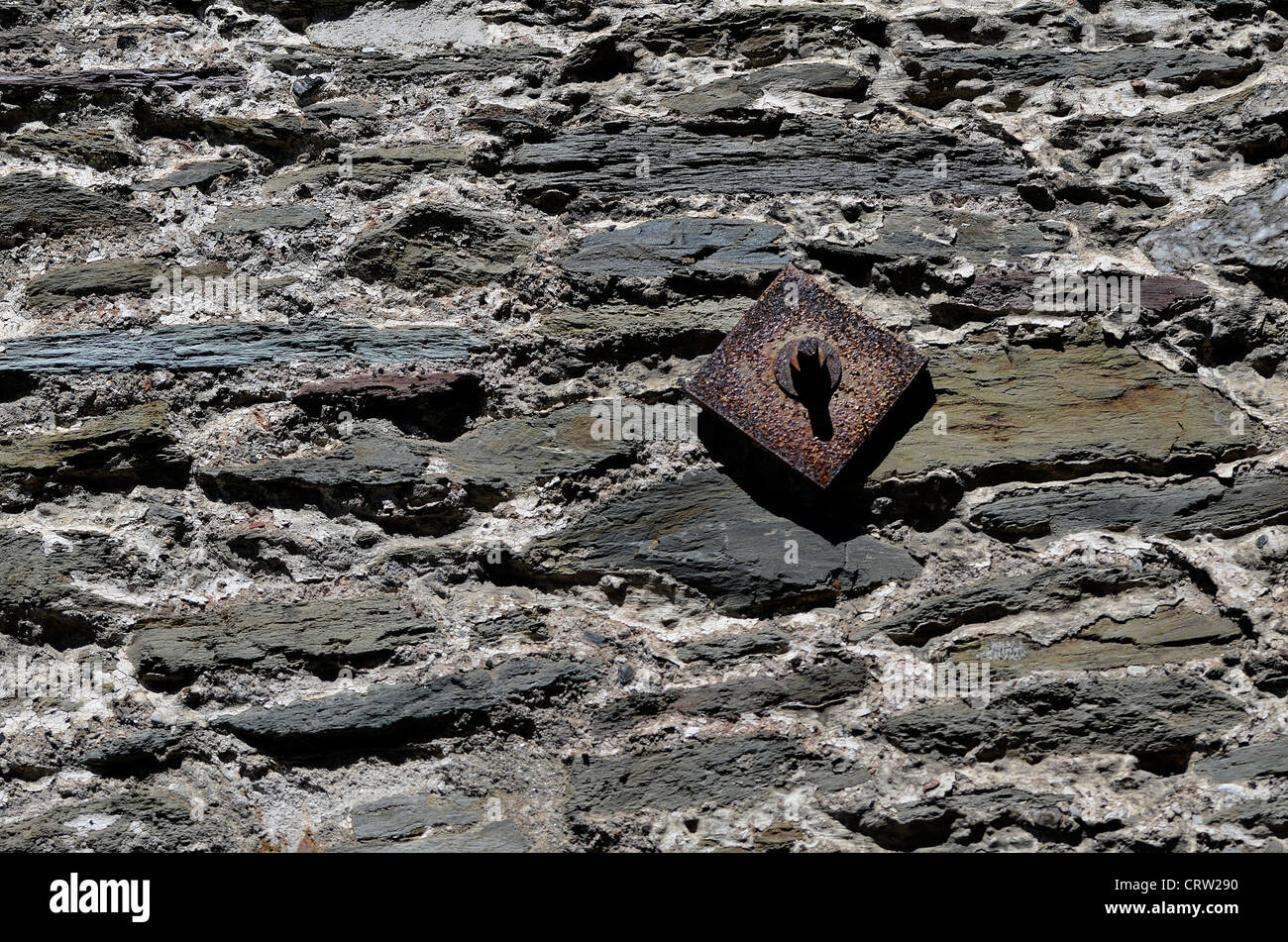 Detail of section of outer building wall, showing external bolt of ...