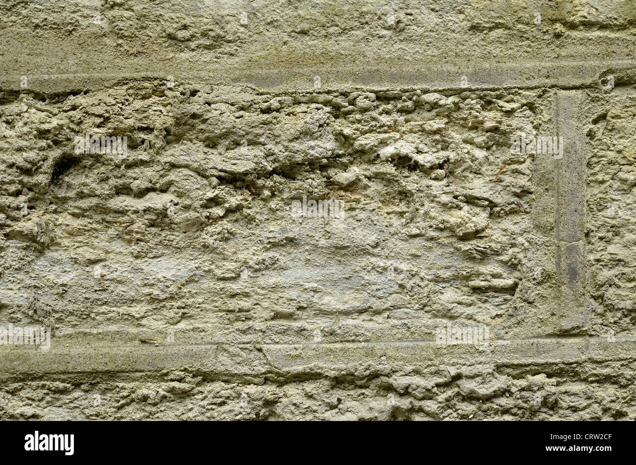 Detail of section of stone wall, showing signs of crumbling texture ...