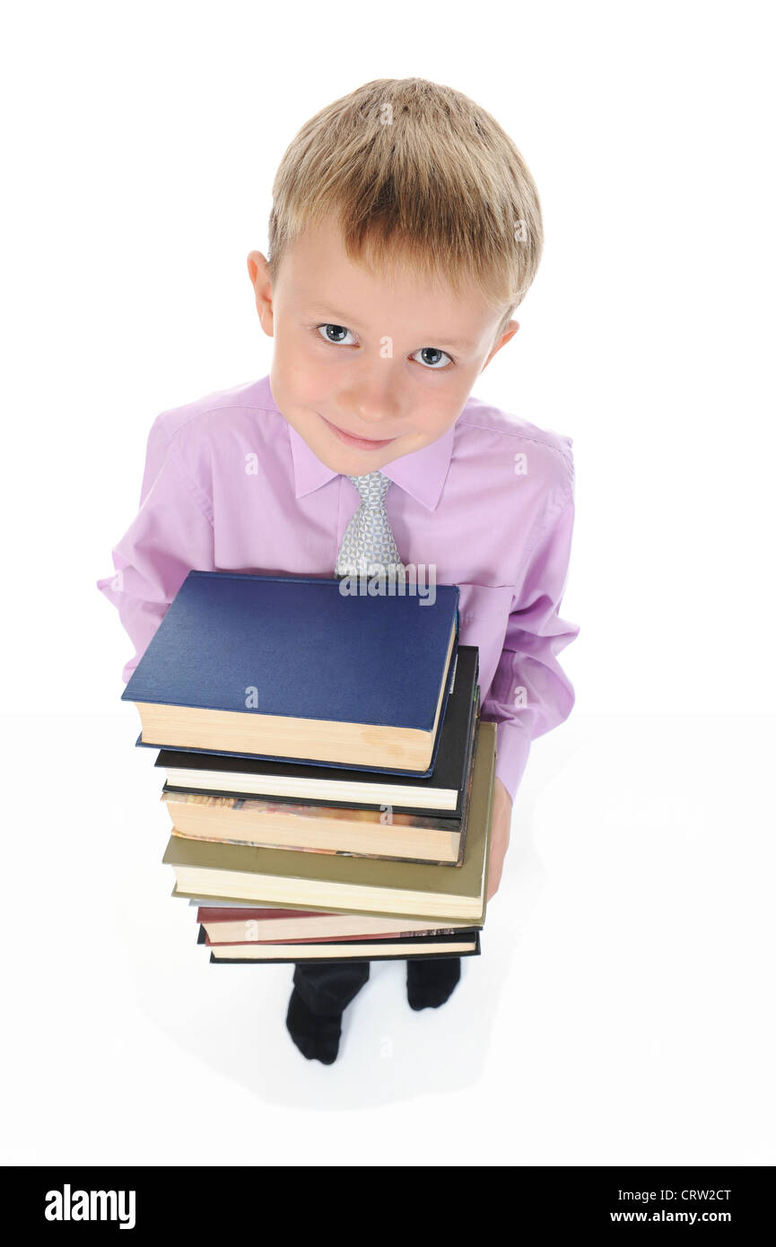 boy holds a stack of books Stock Photo - Alamy