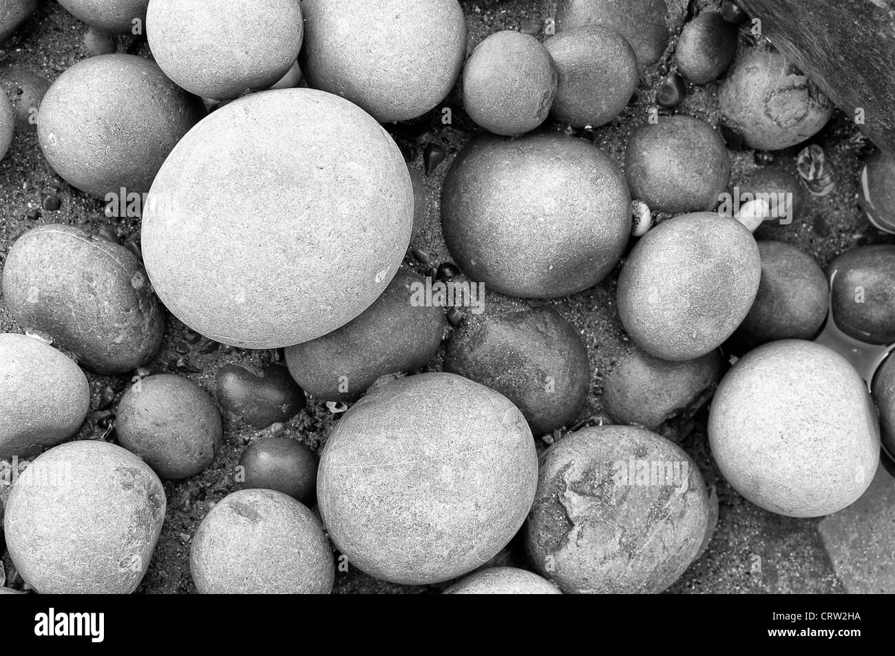Pebbles on beach in circle Stock Photo - Alamy