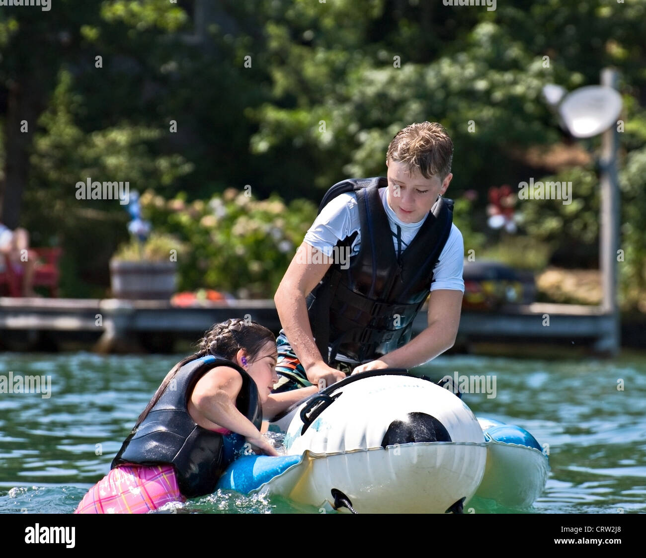 Boy children fun girl summer water hi-res stock photography and images ...