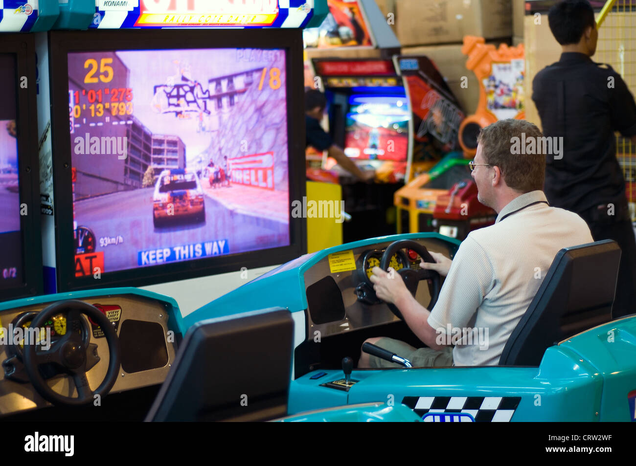 man playing game, Centro Mall, Kuta, Bali, Indonesia Stock Photo - Alamy