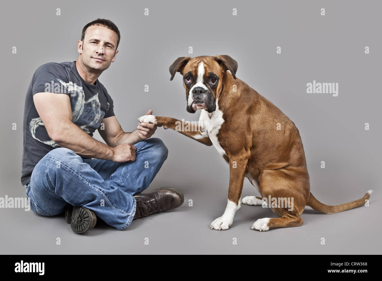 handsome muscle man with his dog Stock Photo - Alamy