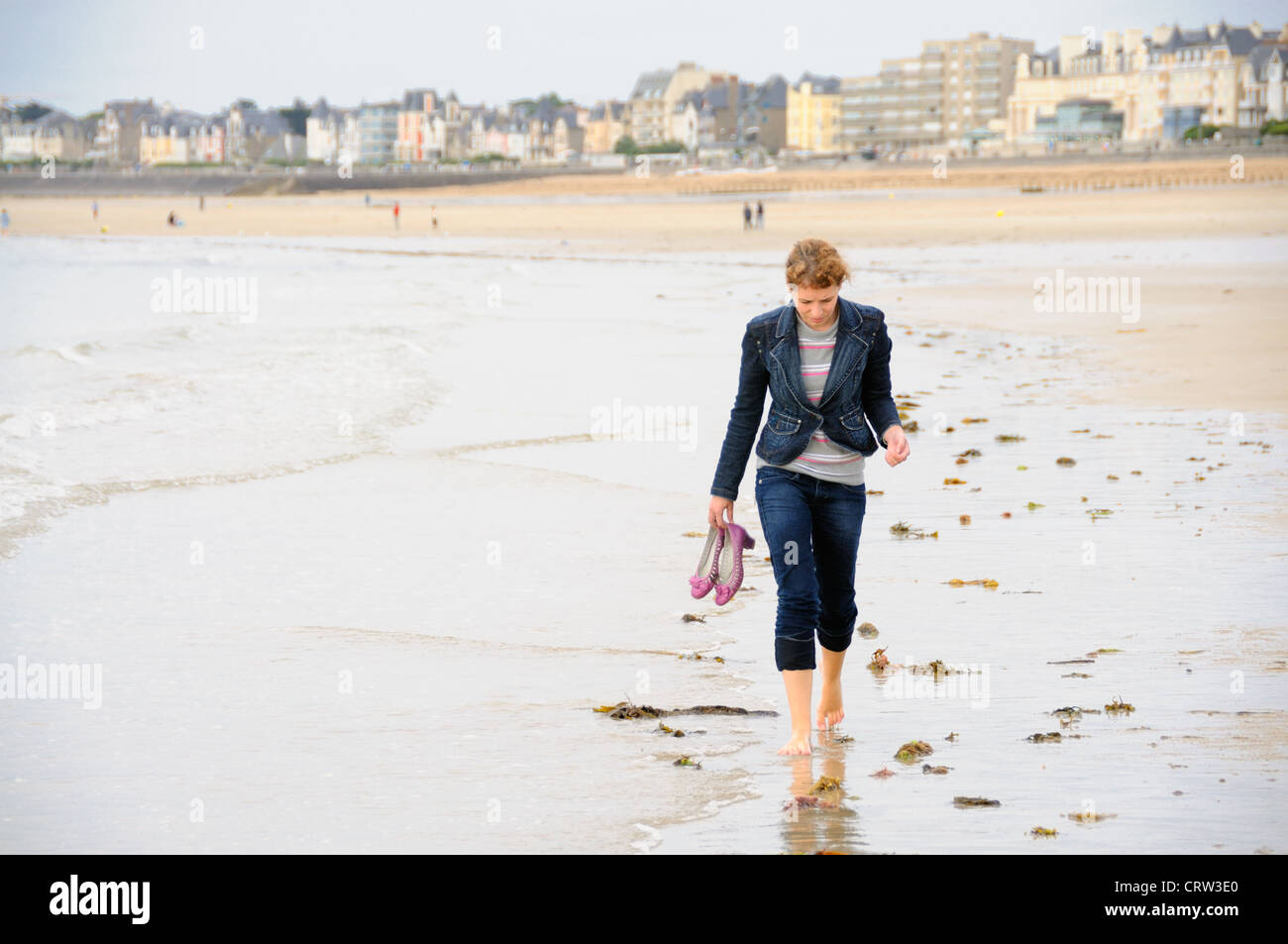 Walking on the beach Stock Photo - Alamy