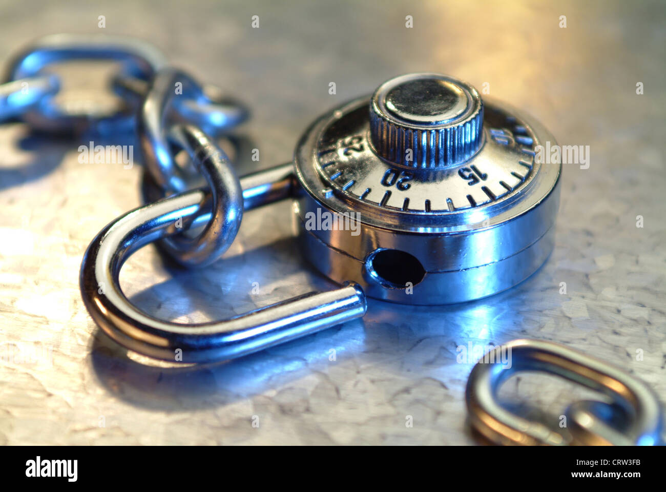 Open lock with combination lock and chain Stock Photo - Alamy